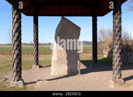 Ancient characters and messages are carved in the Rök Runestone. The ...