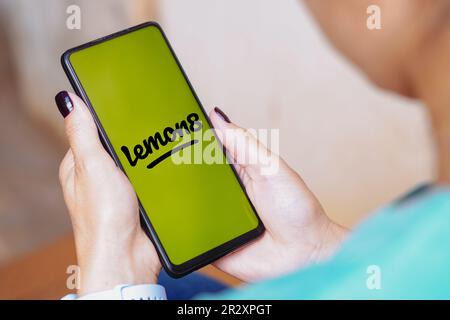 In this photo illustration, the Lemon8 logo is displayed on a ...