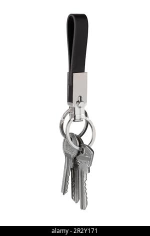 key attached to a leather keychain on a white Stock Photo - Alamy