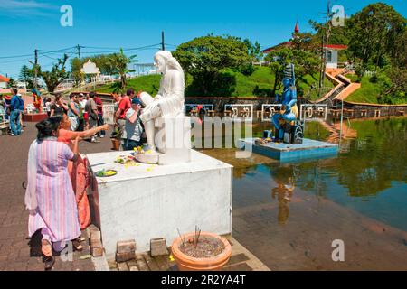 Pilgrims paying homage, Indian Ocean, Sacred Hindu Lake of Ganga Talao ...