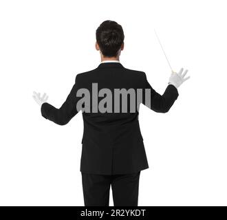 Back view of a male band conductor in formal suit conducting his ...