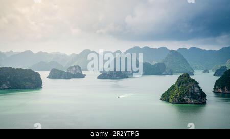 Beautiful limestone karst islands of Ha Long Bay in Vietnam. View from ...