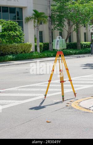 Survey level and transit in building site Stock Photo - Alamy