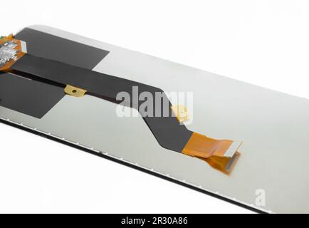 Closeup photo of a smartphone screen with a flexible cable. changing ...