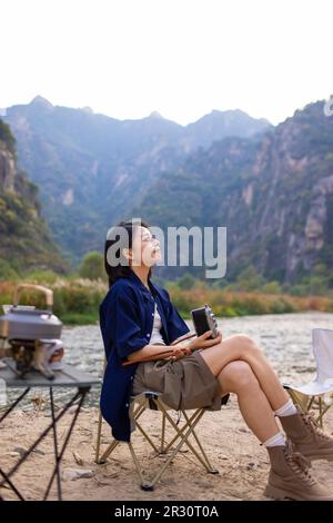 Cheerful photographer enjoying the beautiful natural scenery Stock ...