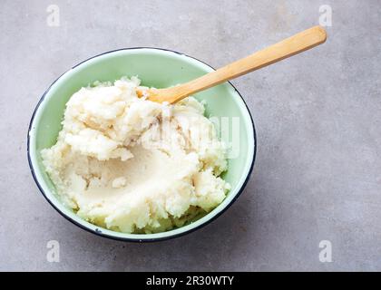 Traditional South African staple, pap or maize meal. Plain in an ...