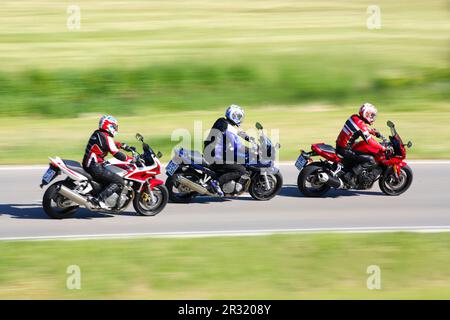 Three motorcycles on the road, Suzuki, Honda, Yamaha Stock Photo - Alamy