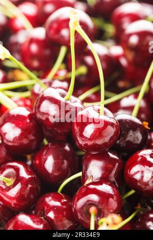 Sweet cherry background Stock Photo - Alamy
