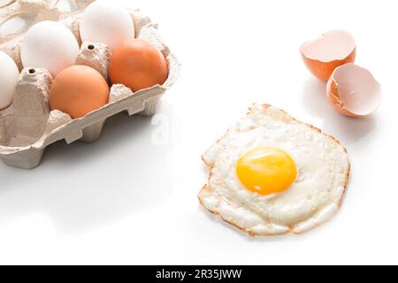 Fried egg with brown egg shells Stock Photo - Alamy