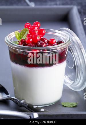 Panna cotta with a berry ragout Stock Photo - Alamy