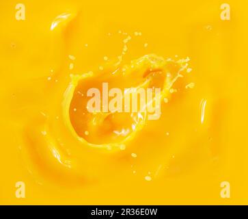 Orange splash with copy space from textured paper isolated on white ...