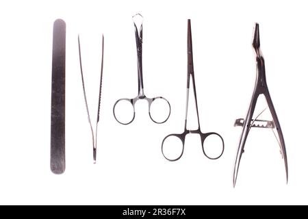 Surgery instruments isolated on white Stock Photo - Alamy