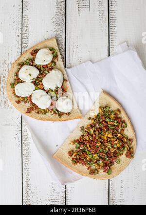 Mozzarella in carozza (Italian fried mozzarella sandwich) sprinkled ...