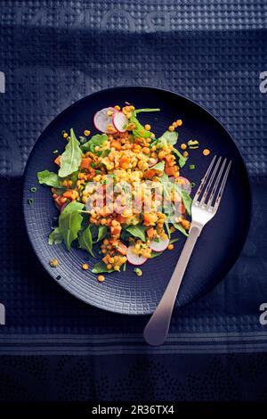 Directly above shot of red radishes arranged on blue wooden table Stock ...