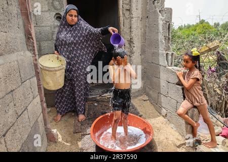 A young girl plays in the slums of Anarba, one of the poorest slums of ...
