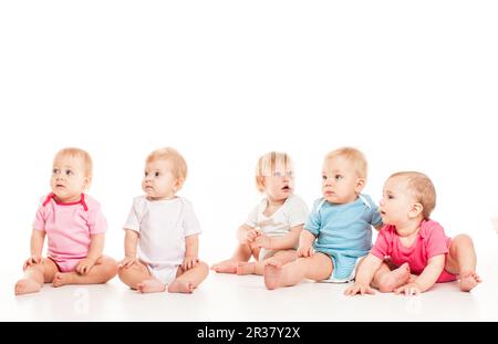 Five babies isolated Stock Photo - Alamy
