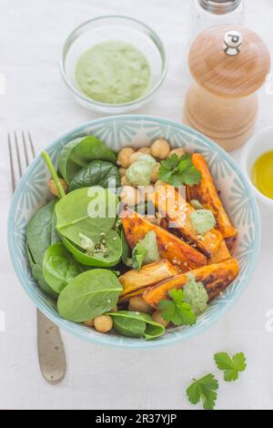 Sweet potato salad bowl with spinach, TVP, corn, black beans, tomato ...