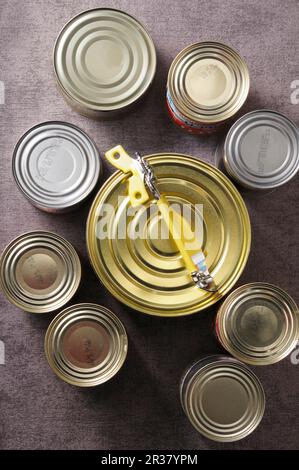 Different tin cans from above as label or storage concept on a white ...