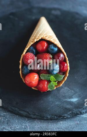 A close-up photograph of various berries, showcasing their vibrant ...