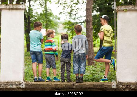 Group of guys in a row back view Stock Photo - Alamy