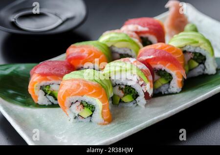 Japanese platter of rainbow rolls maki, inside out seaweed and rice ...