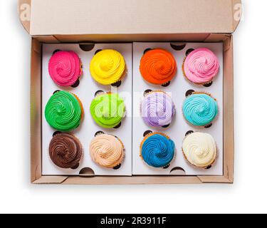 Colourfull rainbow cupcakes top view in the box Stock Photo - Alamy
