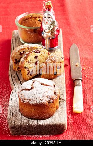 Mini Christmas stollen cakes in aluminum foil Stock Photo - Alamy