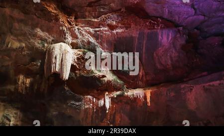 Karstic limestones formation inside the Borra Caves and colourful ...