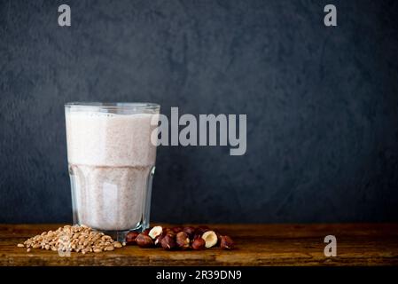 A protein shake made with spelt and hazelnut milk Stock Photo - Alamy