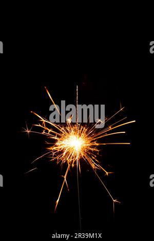 Sparkler isolated on black Stock Photo - Alamy