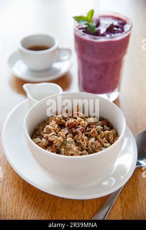 Breakfast muesli, a smoothie and coffee Stock Photo - Alamy
