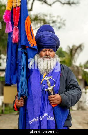 Portrait of a Sikh warrior in traditional dress with weapons Stock ...