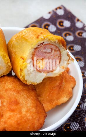 Traditional South African Russian sausage Sputnik or deep fried mash ...
