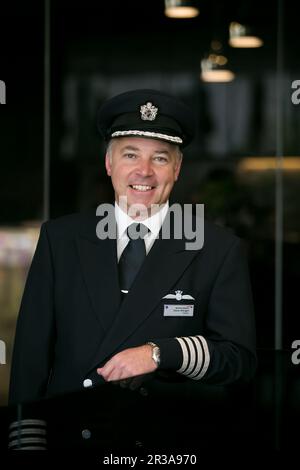 Pilot of a British Airways Airbus jet doing a walk-around check and ...