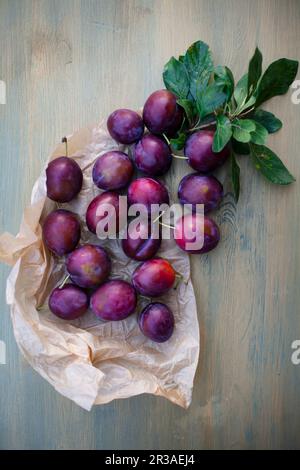 Fresh plums background. Directly above Stock Photo - Alamy