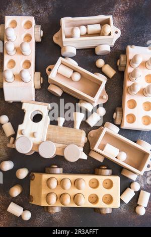 Child playing with wooden car toys one little boy plays with ...
