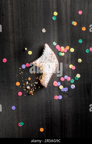 Mutzen (Karneval pastry from the Rhineland, Germany) in plum compote ...
