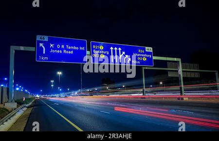 Motorway traffic and signs at night, at Junction 23A on the M1, Castle ...