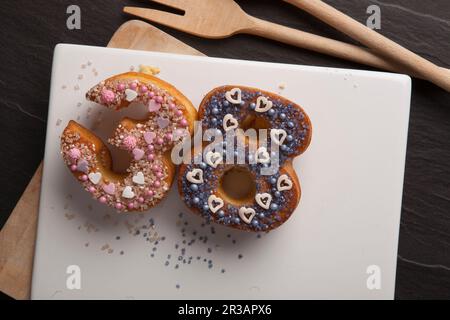 Baked ball-shaped doughnuts Stock Photo - Alamy