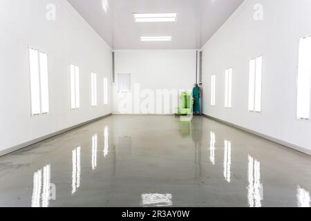 Inside an empty panel beater vehicle workshop for fixing damaged cars ...
