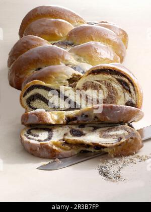 Yeast plait with poppy seeds Stock Photo - Alamy