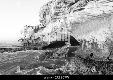 Ocean-side mouth of the Waenhuiskrans Cave near Arniston in the Western ...