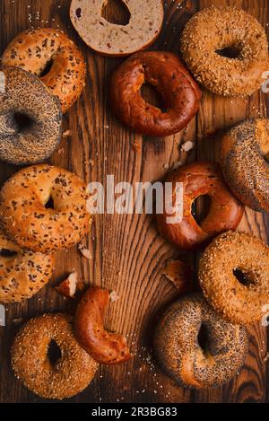 The studio shot of bagels on a table with a brown background Stock ...