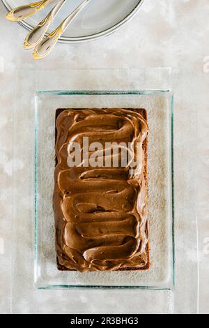 Spiced tea cake with chocolate hazelnut cream Stock Photo - Alamy