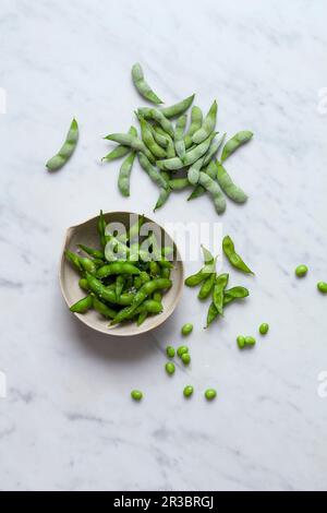 Bowl of Edamame cut out on white background Stock Photo - Alamy