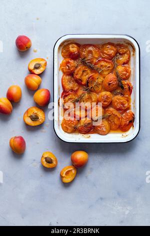 Roasted apricots with rosemary Stock Photo - Alamy