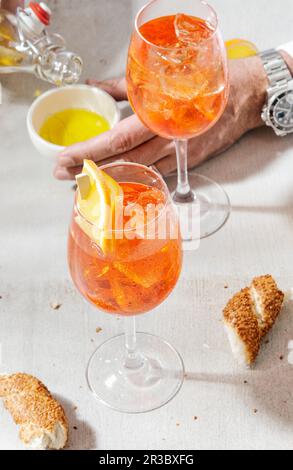Aperol Spritz with bread and oil Stock Photo - Alamy