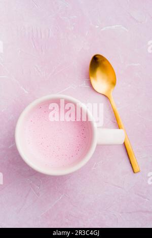 Beetroot powder for cooking healthy beverage in spoon on gray ...