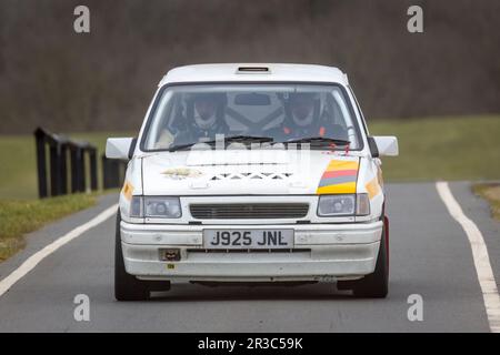 William and Alex Routledge in the 1991 Vauxhall Nova with the control ...