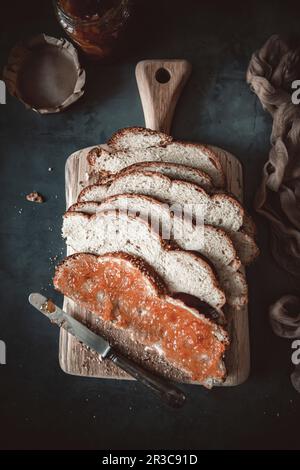Challah (yeast plait) with orange marmalade Stock Photo - Alamy